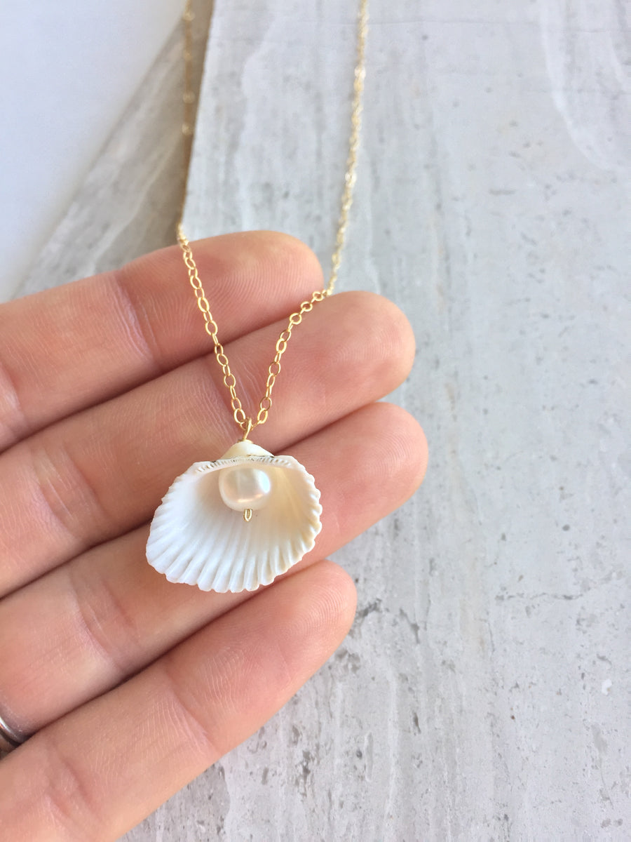 pearl necklace with gold shell